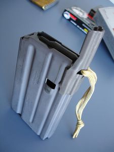 How to Load an AR15/M16 Magazine Using Stripper Clips : 4 Steps ...