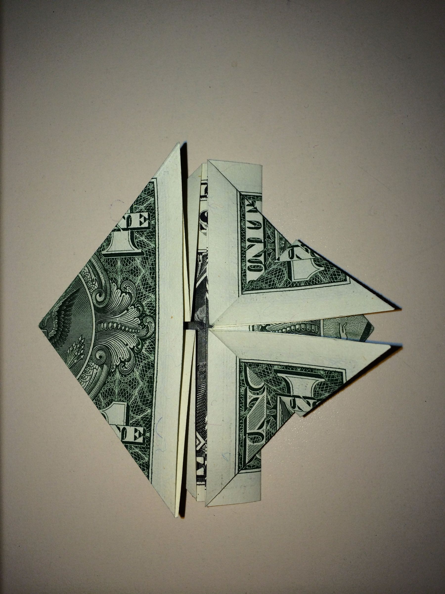 Dollar Origami Heart Holding Quarter : 11 Steps - Instructables